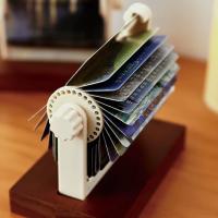 China Hand-Crank Mechanical Flip Desk Calendars With Wooden Stand For Office Decor for sale