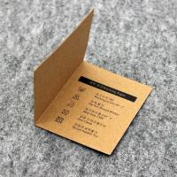 China Kraft Paper Folded Hang Tags With Care Instructions For Apparel Branding for sale