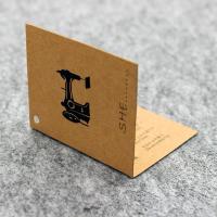 China Kraft Paper Folded Hang Tags With Care Instructions For Apparel Branding for sale