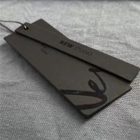 China Multi-Layer Black Paper Hang Tags With Spot UV Finish For Apparel Branding for sale