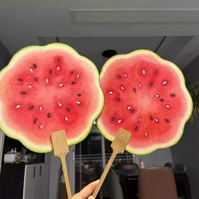 China Creative Watermelon Pattern Round Paper Hand Fans With Wooden Handles for sale