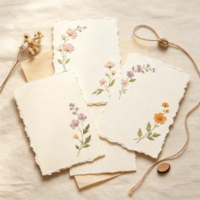 China Custom handmade deckle edge wedding invitation with pressed flowers for sale