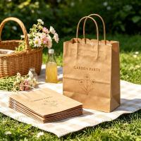 China Scalloped edge kraft paper party loot bag with twisted handles for favors for sale