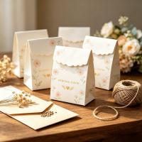 China Scalloped flap mini paper favor bags with block bottom for wedding packaging for sale