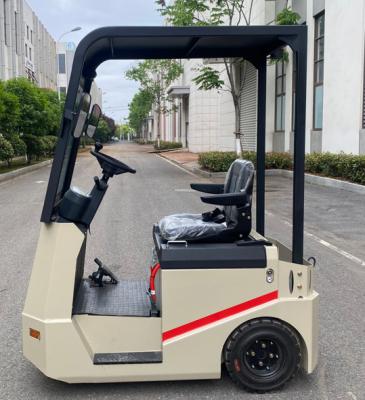 China 2 tons Seated Type Electric Truck Tractor With Polyurethane Tyre and Hydraulic Steering for sale