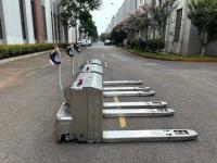 China Electric Pallet Lifter Jack  Body Material SUS 304 Capacity 2 Tons Pedestrian Mechanical Steering for sale