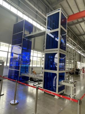 China HuaHeng Continuous Vertical Elevator 50kg Capacity 0.75-3.0kW Motor Customizable Dimensions for sale