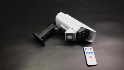 China LED Solar Light Motion Sensor Security Dummy Camera Wireless Outdoor Flood Light IP65 Waterproof Lamp 3 Mode For Home Garden for sale