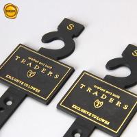 China Gold Foil Stamping Logo Plastic Belt Hangers For Closet for sale