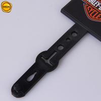 China Customized Printed Black Plastic Belt Hangers With Stickers for sale