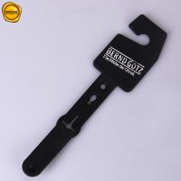 China Customized Logo Embossed Black Plastic Belt Hangers For Shop for sale