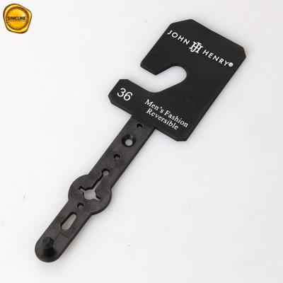 China Embossed Logo PE Plastic Belt Hangers 35mm*140mm for sale