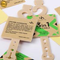 China Paper Sticker Printed Beige Plastic Belt Hangers With Tail for sale