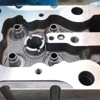 China Car Cylinder Head Assembly Az1095040123 for Sinotruk HOWO Truck Spare Parts in Silver for sale