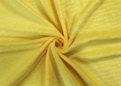China 210GSM 100% Polyester Micro Velvet Fabric 160cm Width Yellow Embossed Pattern Textile for sale