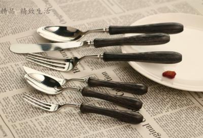 China NC268  Wooden handle high quantity stainless steel cutlery/flatware set/hotel cutlery for sale