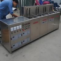 China Industrial Semi Automatic Ultrasonic Cleaning System With 4 Tanks 28kHz Lift Baskets For Auto Parts for sale