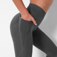 China Knitted yoga pants, solid-color hip pockets for women's running pants for sale
