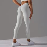 China V waist ruffles pure color peach buttocks yoga pants exercise running fitness tight pants for sale