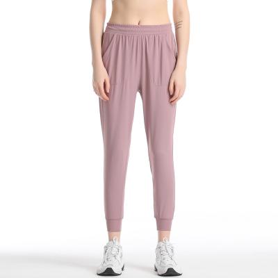 China Yoga suit nude yoga pants women high waist hip-lift running tight elastic fitness pants for sale