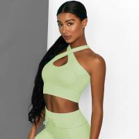 China Solid color candy fitness tank top fashion gym running cross straps bra yoga dress woman for sale