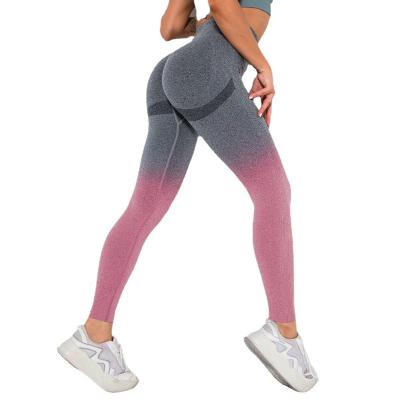 China Seamlessly tapered smiley face yoga pants tight butt gym pants sports running yoga dress woman for sale