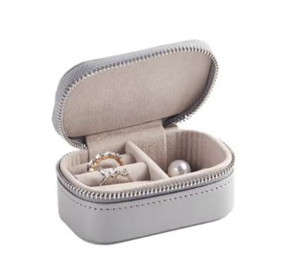 China Mini Jewelry Box Handmade Costume PU Leather Travel Zipper Women Ring Box with Logo for sale