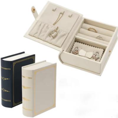 China Luxury Leather Travel Jewelry Case Portable Travel Book Shape Jewelry Packaging Box for sale