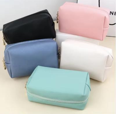 China Soft PU Leather Cosmetic Cases Portable Ladies Travel Makeup Bag With Zipper OEM Color for sale