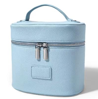 China OEM Portable Handle Leather Cosmetic Cases Ladies Travel Toiletry Bag Light Blue Color for sale
