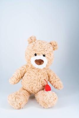 China Valentine'S Day Khaki Teddy Bear With Heart Pocket Unique Design Plush Toy for sale