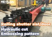 China High Efficiency Roller Door Roll Forming Machine With Hydraulic Cutter And Digital Guide System for sale