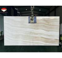 China Polished Backlit Onyx Wall Panels and Countertop in Modern White Stone Form Big Slab for sale