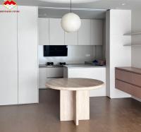 China Polished Beige Round Travertine Dining Table Modern Stone Furniture for Living Room for sale