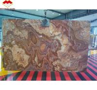 China Polished Translucent Natural Tiger Red Onyx Marble for Modern Backlit Jade Hotel Design for sale
