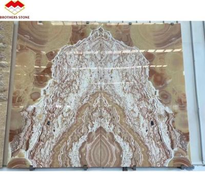 China Modern Design Polished Marble Bookmatch Tile Custom Backlit Red Dragon Jade Onyx Wall for sale