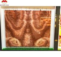 China Backlit Red Onyx Marble Stone Book Matched Slab for Transparent Marble Table Pattern for sale