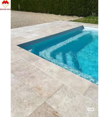 China Modern Design Style Natural Silver Travertine Stone Ivory Deck Tile for Pool Flooring for sale