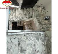 China Natural Stone Stairs in Modern European Style with Cut-to-Size Big Slab Polished Tiles for sale