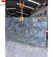 China Big Slab Polished Shinning Labradorite Blue Granite Countertop and Island Table Design for sale