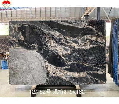 China Hot Ocean White/Black Marble Wall and Flooring Tile Design Book Match Marble Elephant White Slab for sale