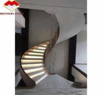 China Hotel Indoor Marble Staircase with Modern Spiral Curved Design and Cut-to-Size Option for sale