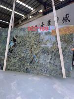 China Big Slab Polished Shinning Labradorite Blue Granite Countertop and Island Table Design for sale