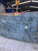 China Big Slab Polished Shinning Labradorite Blue Granite Countertop and Island Table Design for sale