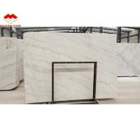 China Honed Guangxi White Marble Quarry Modern Natural Block for Hotel Indoor Decorations for sale