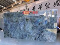 China Big Slab Polished Shinning Labradorite Blue Granite Countertop and Island Table Design for sale