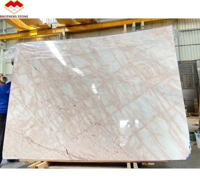 China Custom White Onyx Marble Matt Finish Modern Luxury Round Dining Table with Red Veins for sale