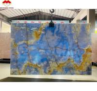 China Natural Translucent Blue Onyx Stone Slab for TV Background Wall Panel in Golden Blue for sale