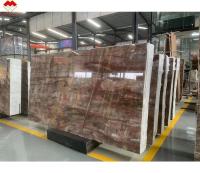 China Translucent Blood-Orange Red Onyx Stone with White Veins CNF Red Wood Veins Marble Wall Panel for sale
