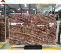 China Book Match Translucent Blood-Orange Red Vein Onyx Marble Stone for Lavabo Decoration for sale